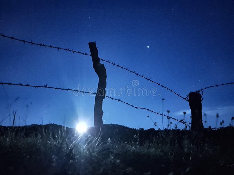 Night fence stock image. Image of wire, night, moon - 126416925
