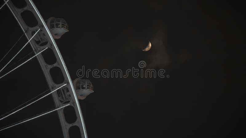 Moon at the Night Sky with Ferries Wheel in the Foreground Stock Photo ...
