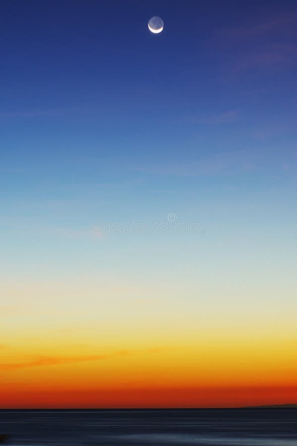 Moon and Ocean sunset stock image. Image of glow, afterglow - 8502853