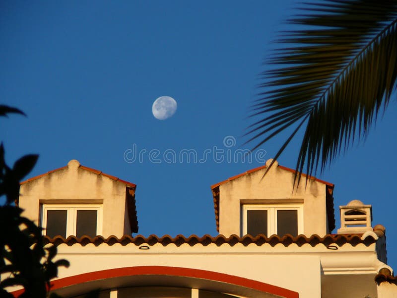 Moon over Alora stock photo. Image of blue, building - 46746624