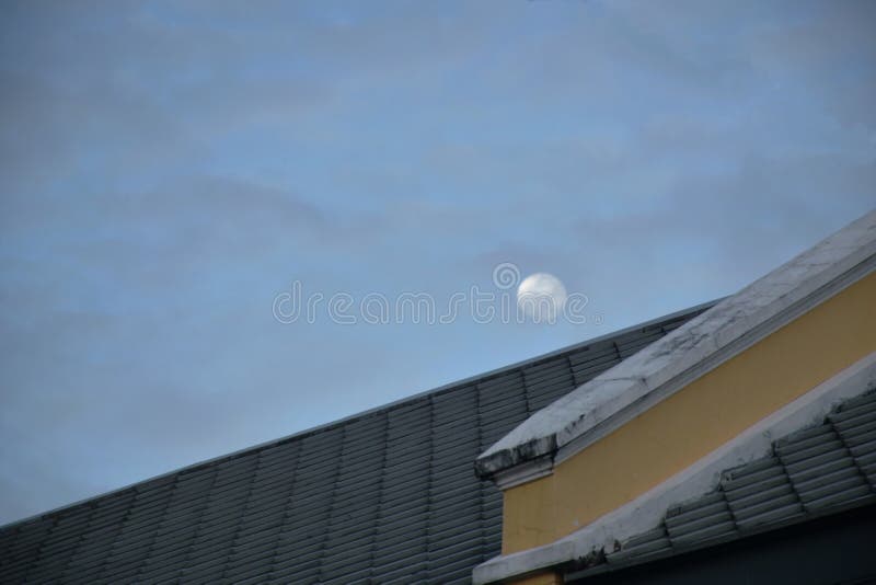 Moon Over Home Rooftop in Sky on Evening Stock Photo - Image of clear ...