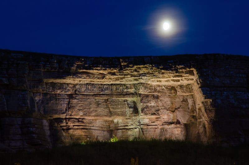 Moon Over Illuminated Limestone Cliff Stock Photo - Image of ...