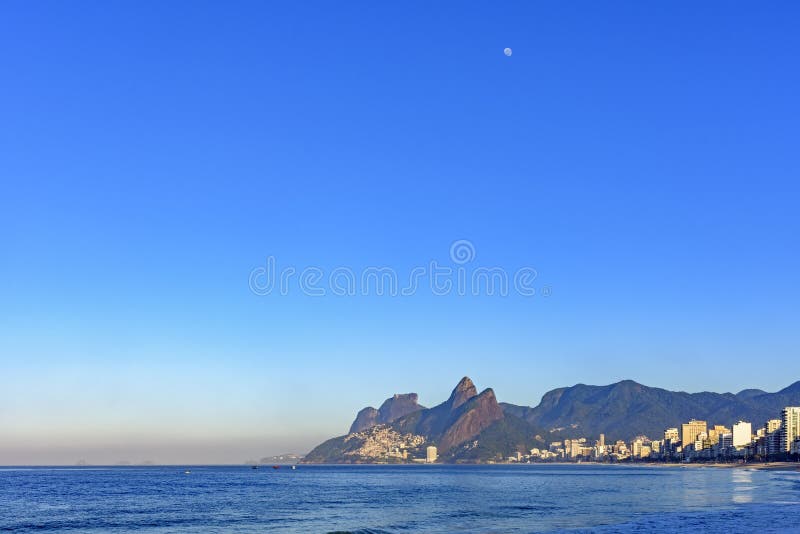 Moon over Ipanema beach stock image. Image of skyline - 96107433