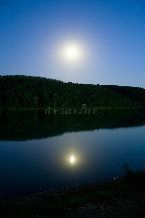 Moon over the lake stock photo. Image of forest, island - 2827368