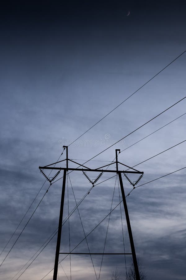 Moon over power lines stock image. Image of clouds, night - 25568463