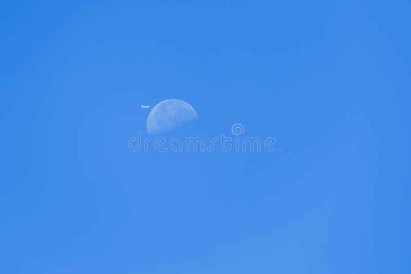 Daily Moon with Plane in the Blue Sky Stock Photo - Image of crater ...