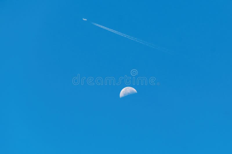 Daily Moon with Plane in the Blue Sky Stock Image - Image of daylight ...