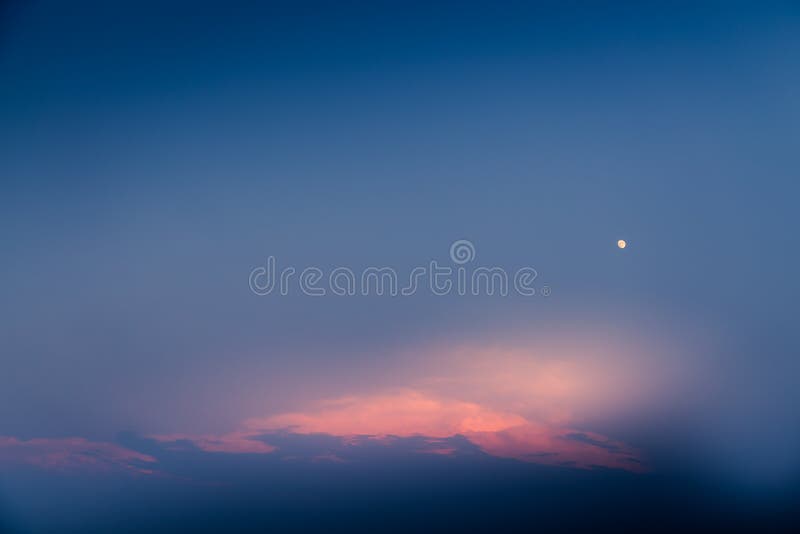 Moon and the Red Cloud Formation during Sunsets Stock Image - Image of ...