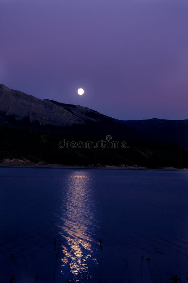 Moon rise stock image. Image of holiday, water, purple - 6992939
