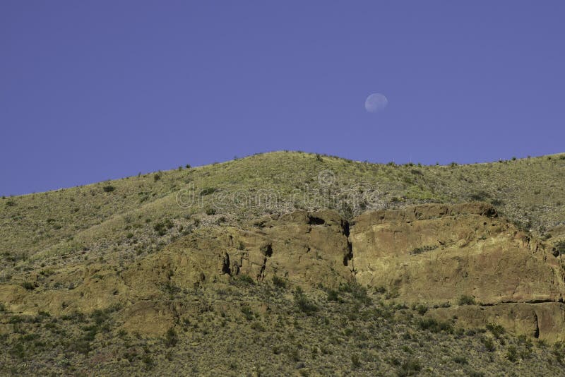 Moon rising over the hill stock image. Image of celestial - 101147131
