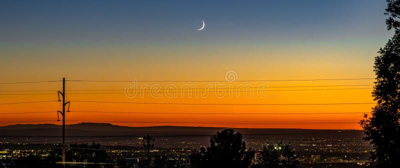 Moon Rising Over a Misty Mountain Landscape in this Tranquil Nighttime ...