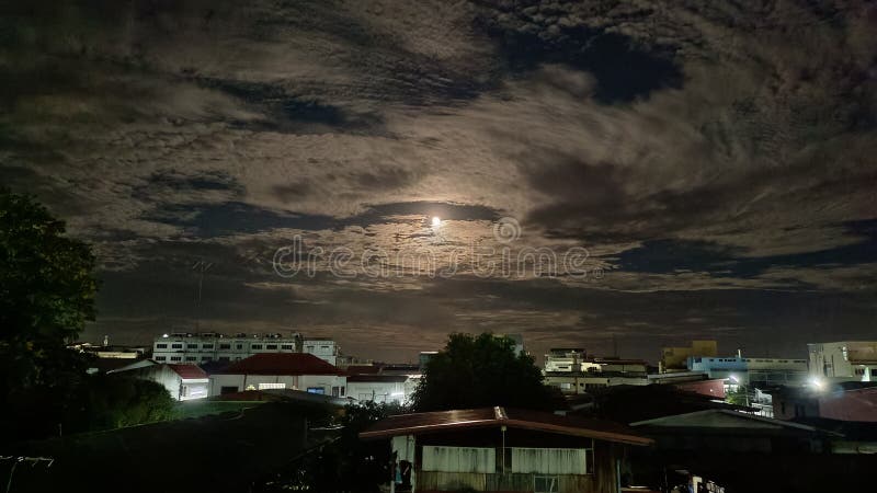 The moon shine on roof top stock image. Image of shine - 283090055