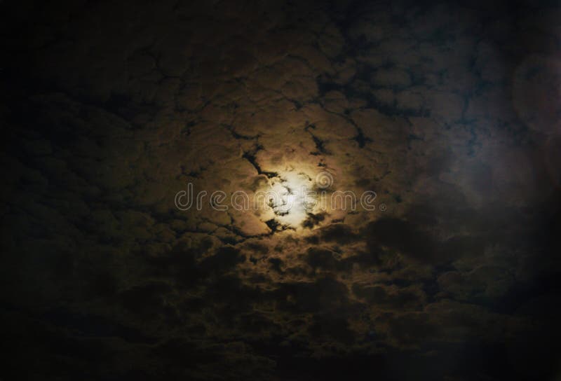 Moon. Slightly Cloudy Night Sky, the Moon Shining Brightly through the ... Moon. Slightly Cloudy Night Sky, the Moon Shining Brightly through the ...