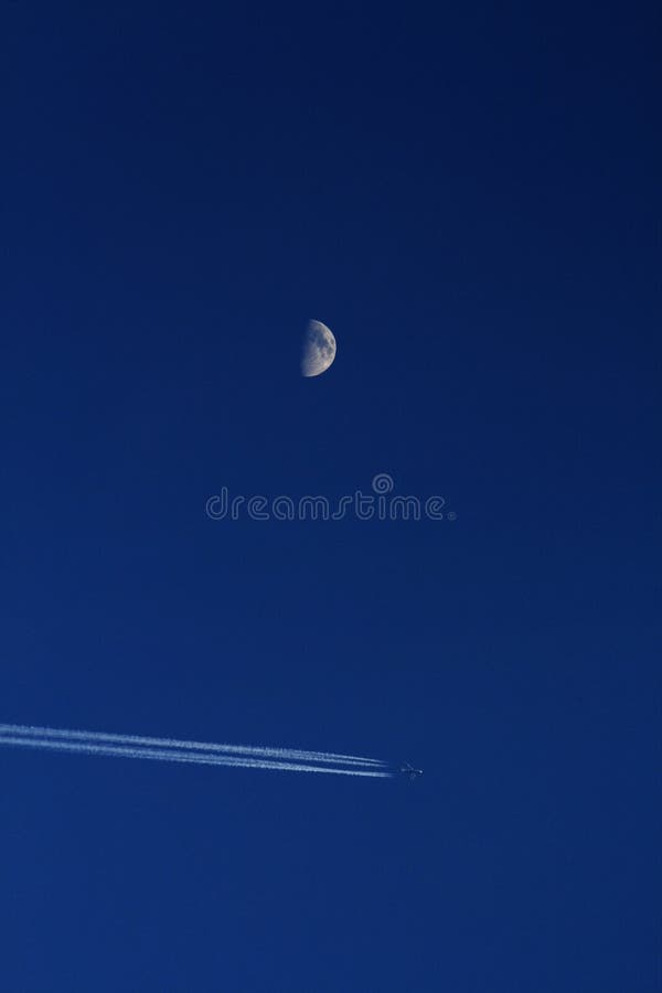 Moon with plane stock photo. Image of dusk, blue, night - 111855260
