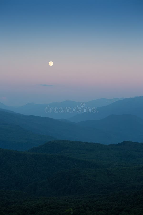 Moon at Sunset in Mountains Stock Photo - Image of horizon, clear ...