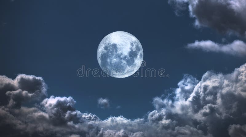 The Moon Surrounded by Clouds. a Photo of the Moon Surrounded by ...