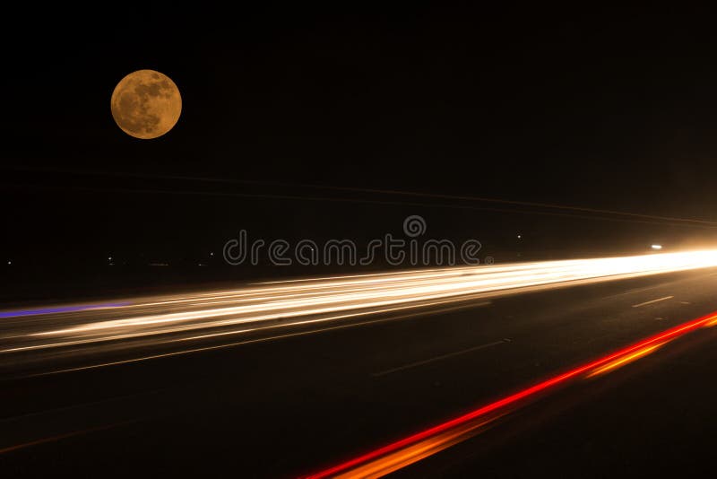 Moon and Traffic in city stock image. Image of asia - 268169581