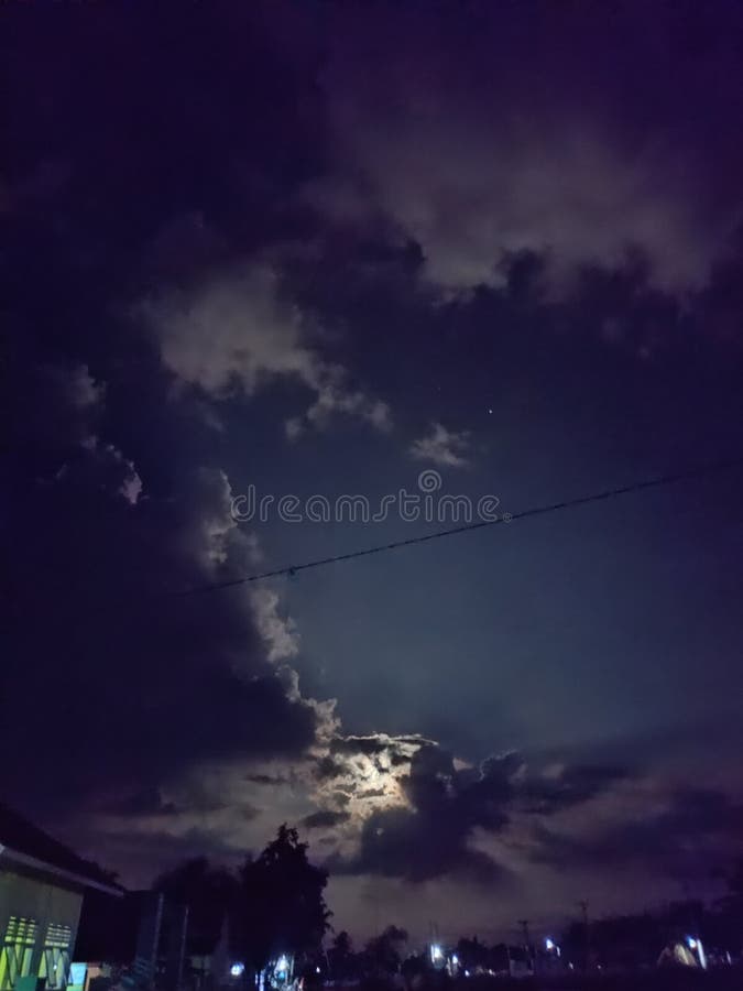 Moonlight Hiding Behind the Night Sky Stock Image - Image of clouds ...