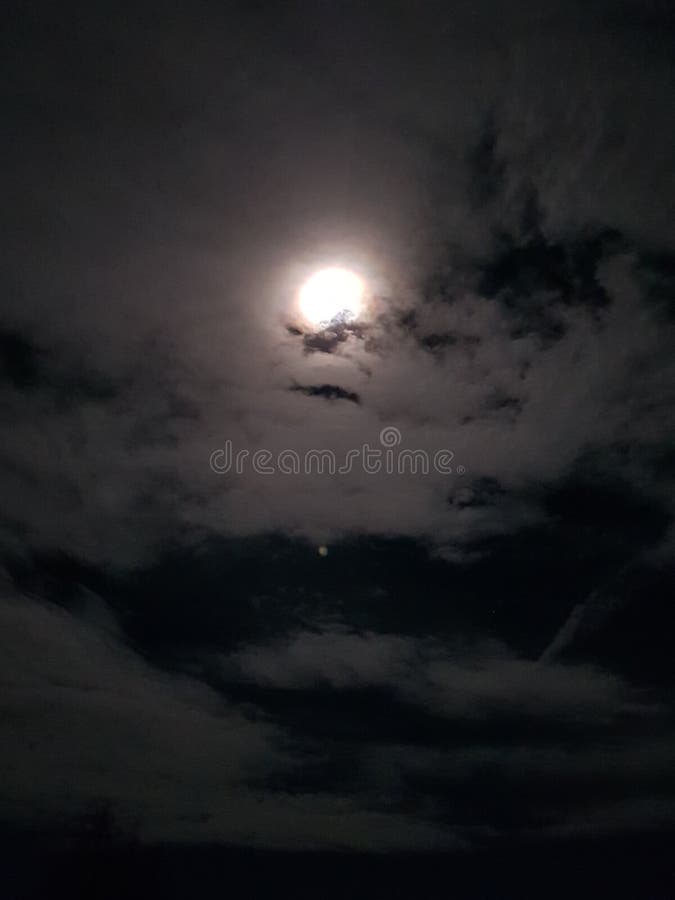 Cloudy full moon night stock image. Image of moonlight - 141743383
