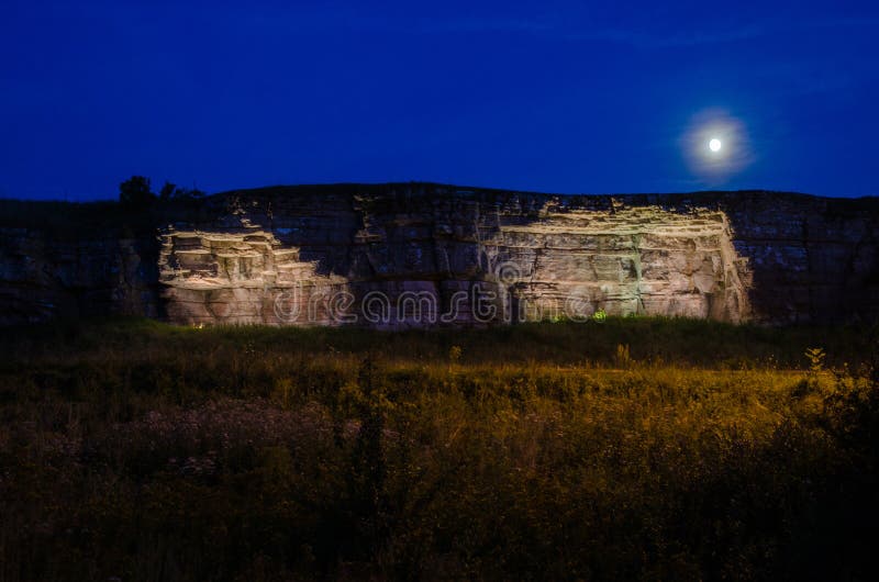 Moonlight Over Illuminated Cliffs Stock Image - Image of moonlight ...