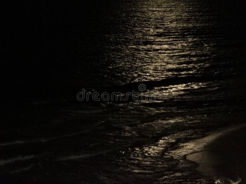 Moonlight on the Sea Surface on a Dark Night Stock Photo - Image of ...