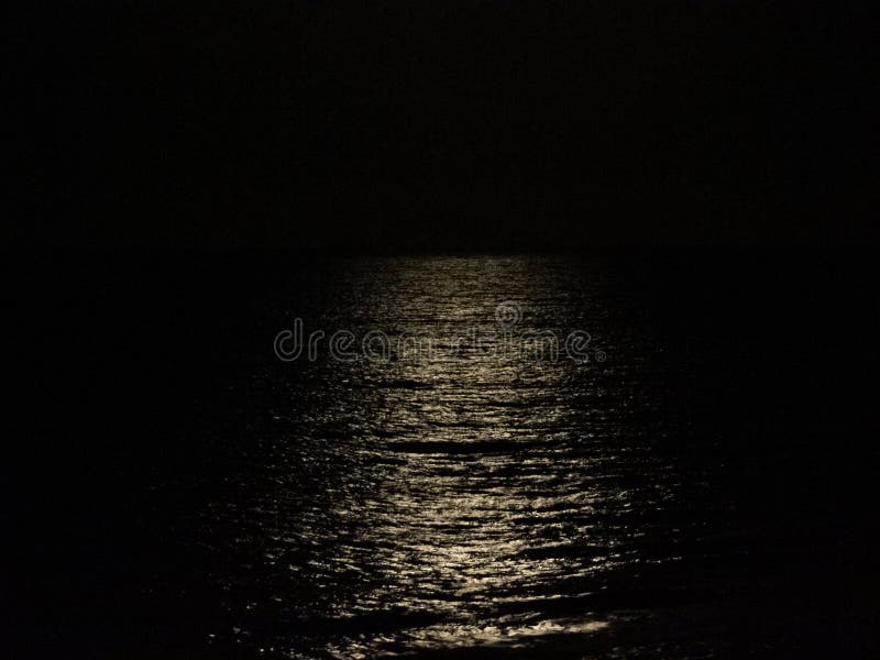 Moonlight on the Sea Surface on a Dark Night Stock Photo - Image of ...