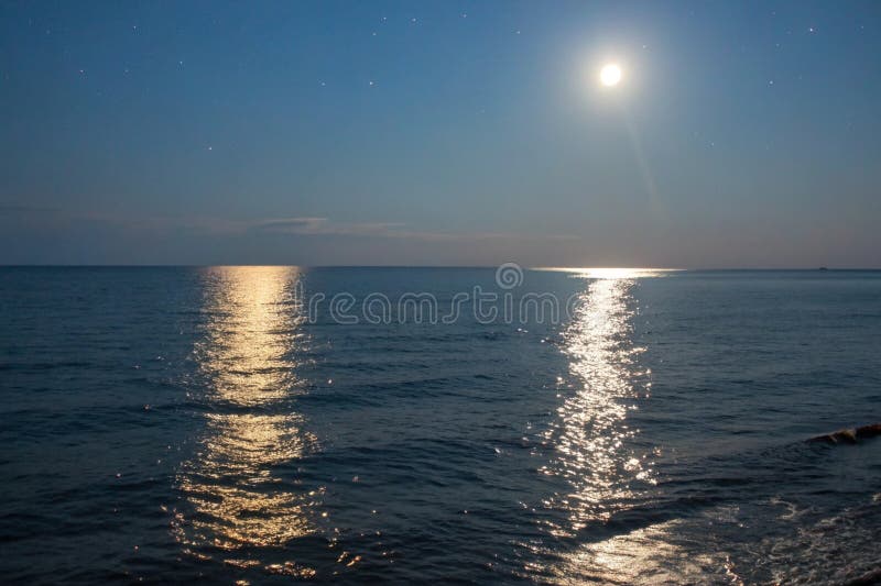 Moonlight on the sea stock illustration. Illustration of waves - 370349363