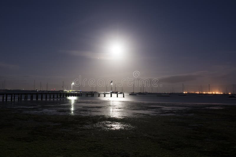 Moonlit Bay stock photo. Image of nightime, shining, pier - 49935226