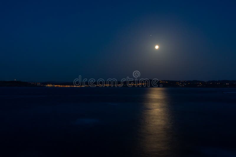 Moonlit Walkway. Reflection of the Moon on the Water Stock Image ...