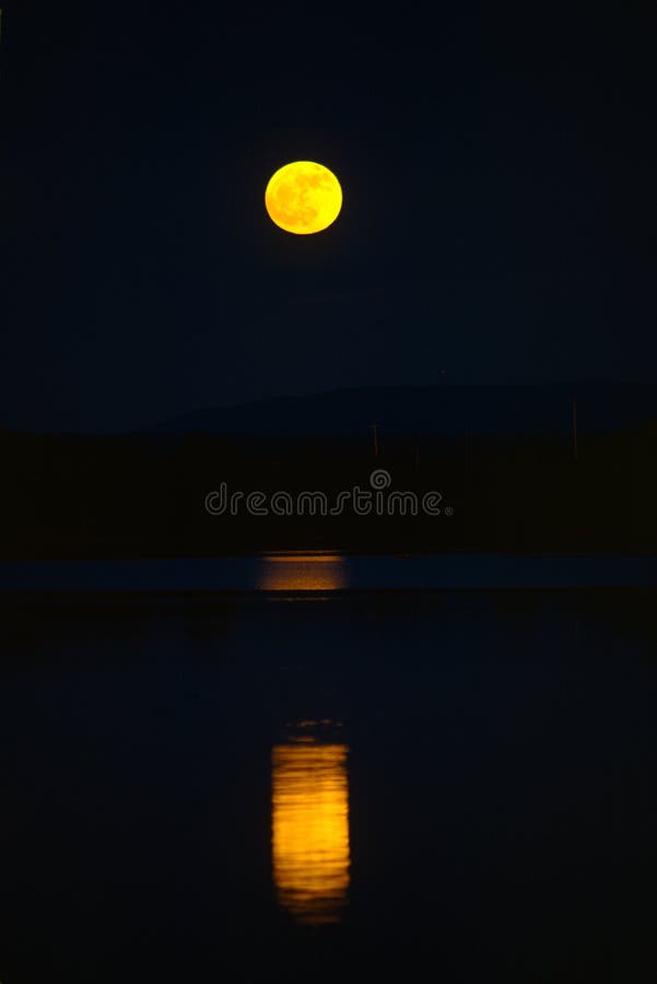 Moonrise over lake stock photo. Image of lake, dark, water - 4698928