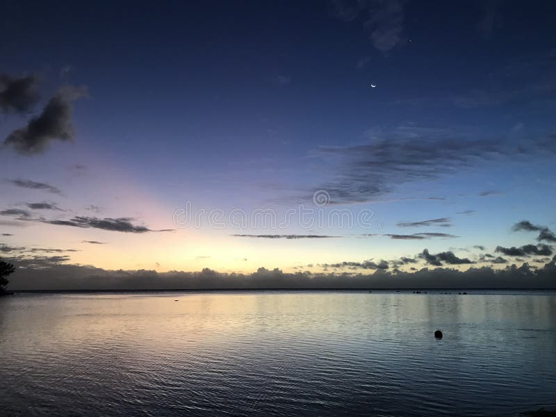 Moorea sunset stock image. Image of colorful, blazing - 128427991