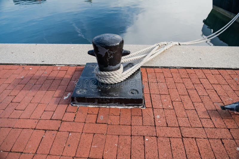 Mooring Bollard with Rope at the Pier of Boltimore S Inner Harbor Stock ...