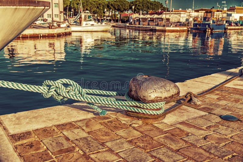 Mooring cable on bollard stock photo. Image of ocean - 70755434
