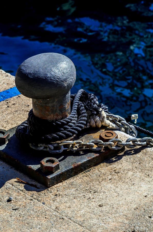 Mooring Post on the Waterfront in a Small Marina, Element for Mo Stock ...