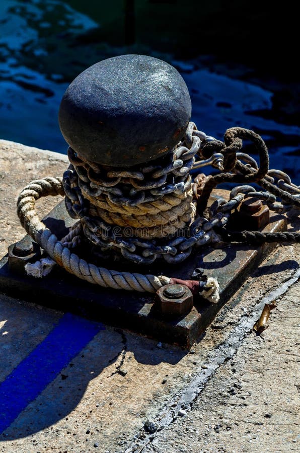 Mooring Post on the Waterfront in a Small Marina, Element for Mo Stock ...