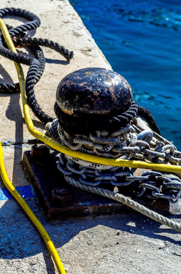 Mooring Post on the Waterfront in a Small Marina, Element for Mo Stock ...