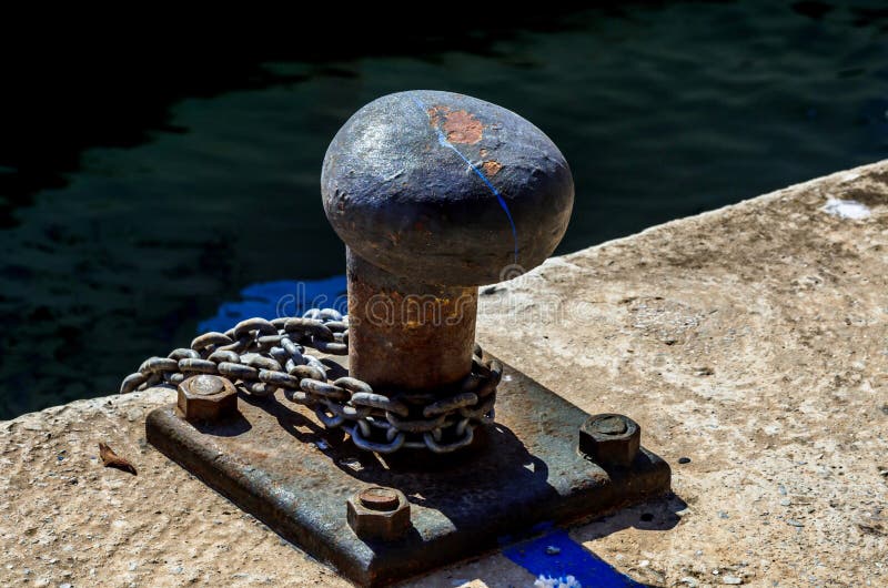 Mooring Post on the Waterfront in a Small Marina, Element for Mo Stock ...