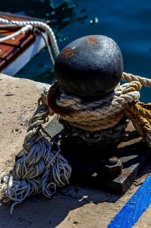 Mooring Post on the Waterfront in a Small Marina, Element for Mo Stock ...