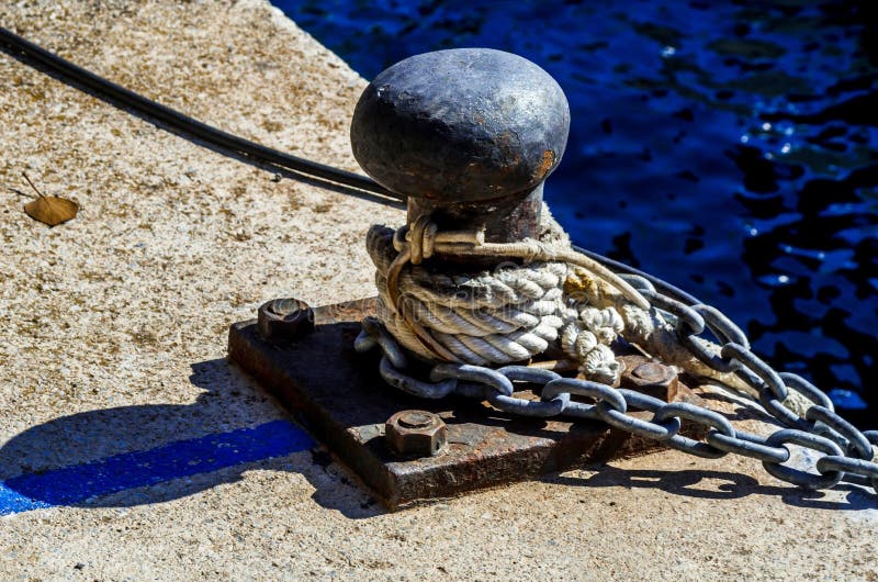 Mooring Post on the Waterfront in a Small Marina, Element for Mo Stock ...