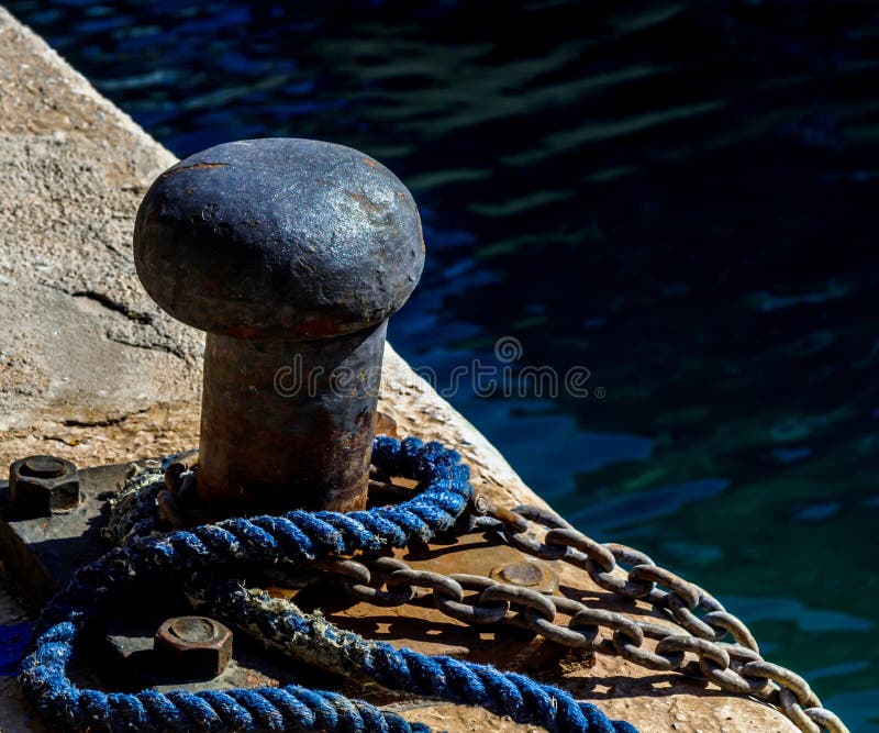 Mooring Post on the Waterfront in a Small Marina, Element for Mo Stock ...