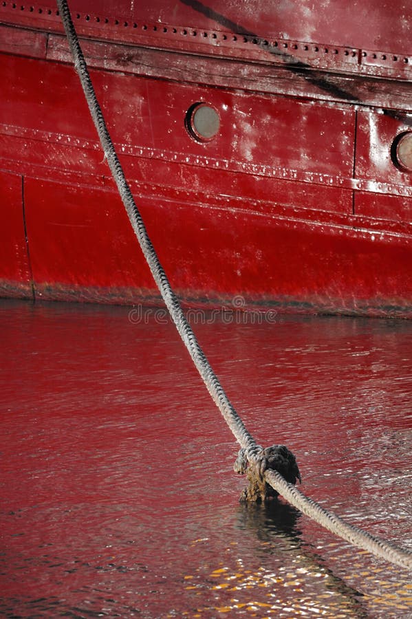 Mooring Rope To Red Tugboat Stock Image - Image of boat, abstract: 6977115
