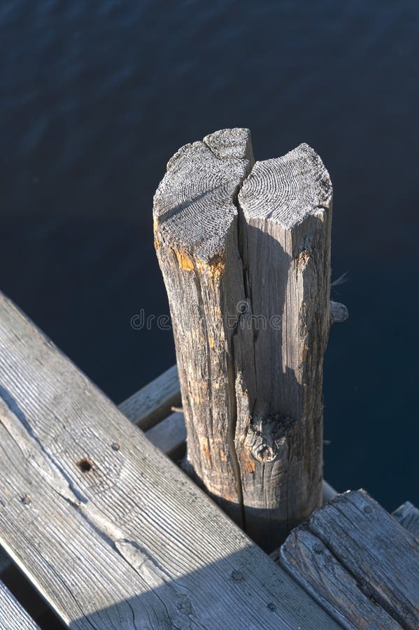 Mooring Wooden Post for a Small Boat Stock Photo - Image of vacation ...