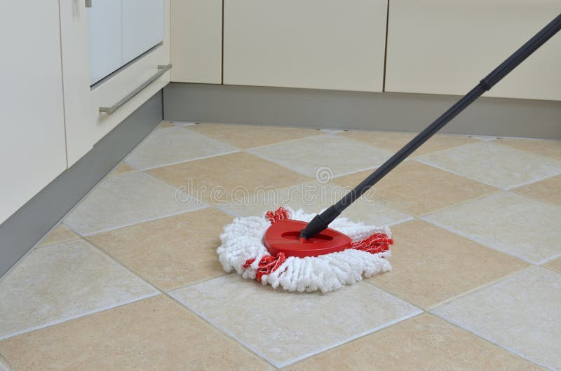 Mop on kitchen floor stock image. Image of tiles, indoors - 147239557