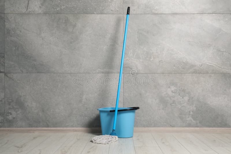 Mop and Plastic Bucket Indoors. Cleaning Floor Stock Photo - Image of ...