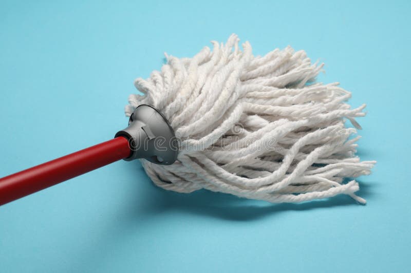 Mop with Plastic Handle on Light Blue Background, Closeup Stock Image ...