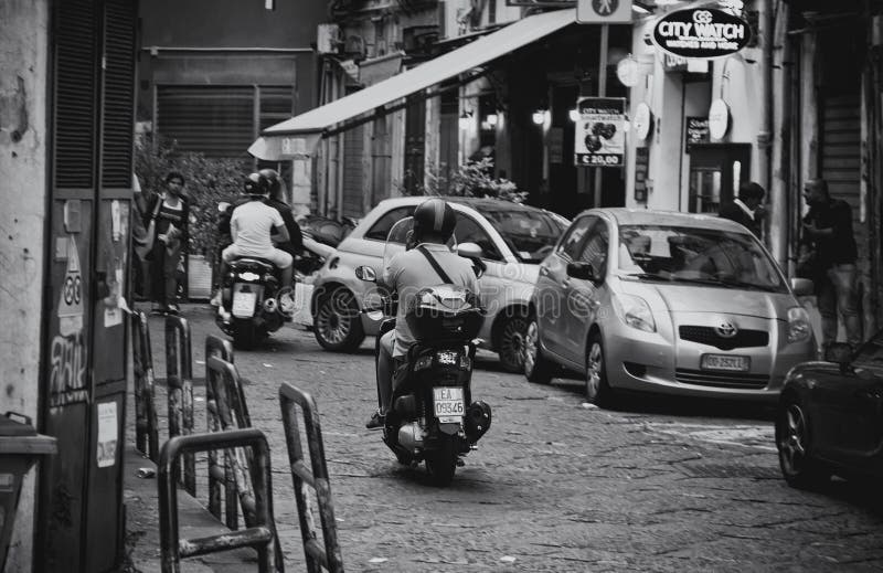 Moped Drivers editorial photo. Image of street, life - 73999156