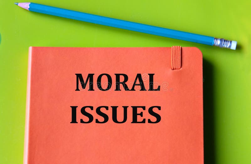 MORAL ISSUES - Words on an Orange Notepad on a Background of Multi ...