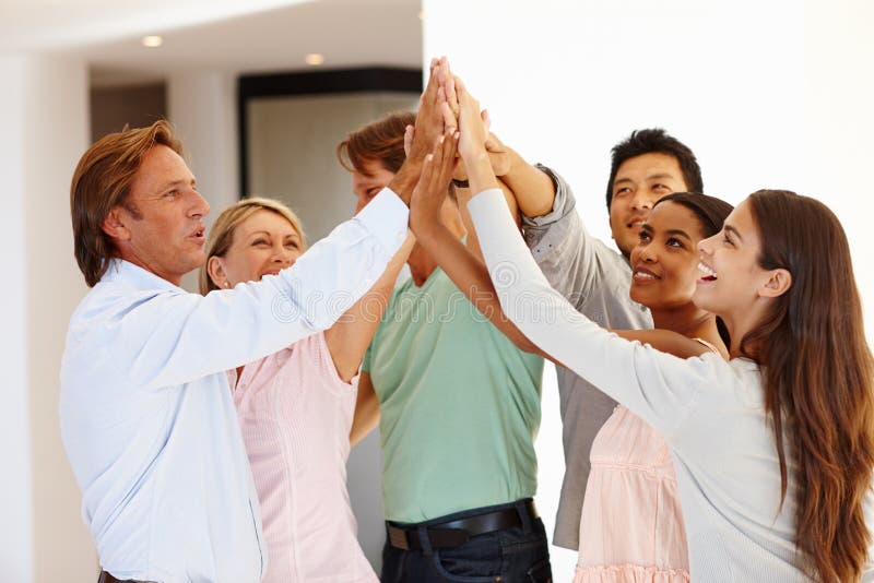 More Hands Help Lighten the Load. a Group of Colleagues Doing a Team ...