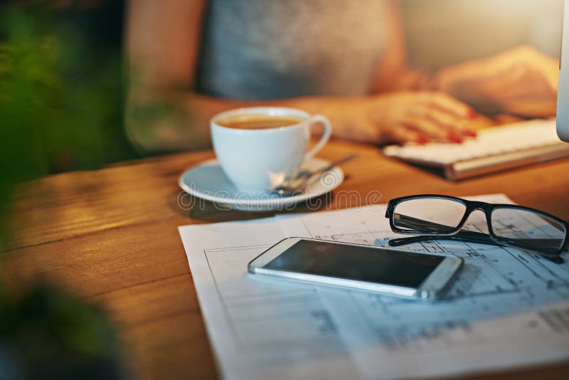More Hours, More Success. a Woman Working on a Computer with Coffee, a ...