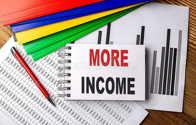 MORE INCOME Text on Notebook with Folder on Chart Stock Photo - Image ...